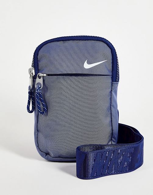 Nike Sportswear Essentials cross body bag in light blue | CV1064-492 ...